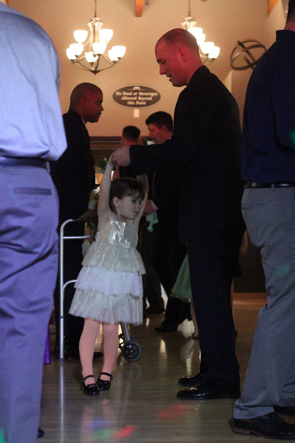 Dads and daughters celebrate an early Valentine’s Day at dance ...
