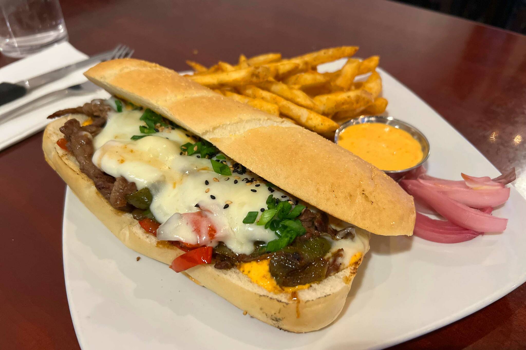 The Brick Kitchen + Lounge offers pub classics with cultural twists ...